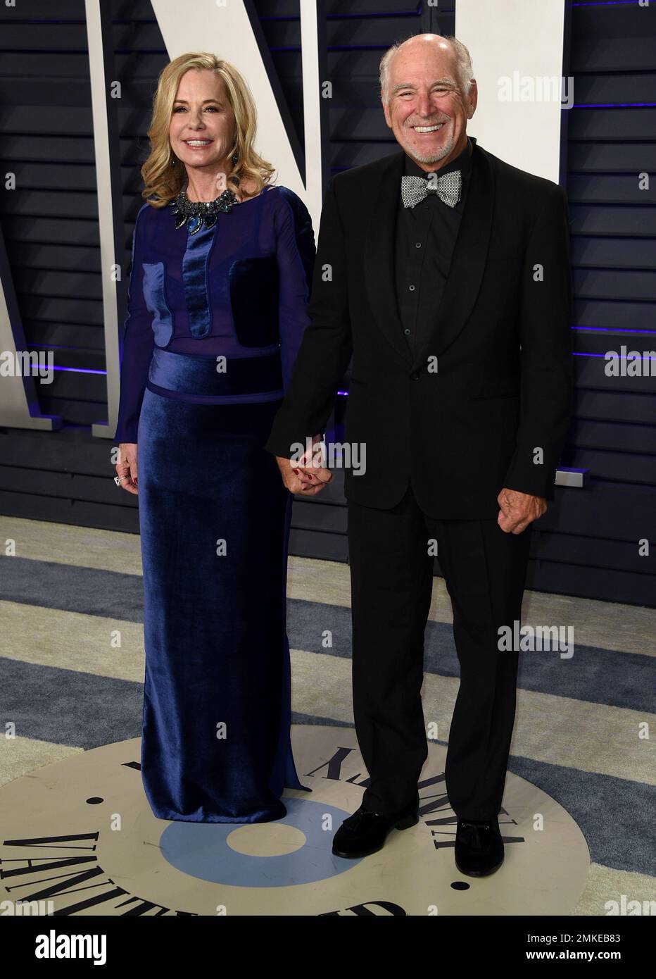 Jane Slagsvol, left, and Jimmy Buffet arrive at the Vanity Fair Oscar ...