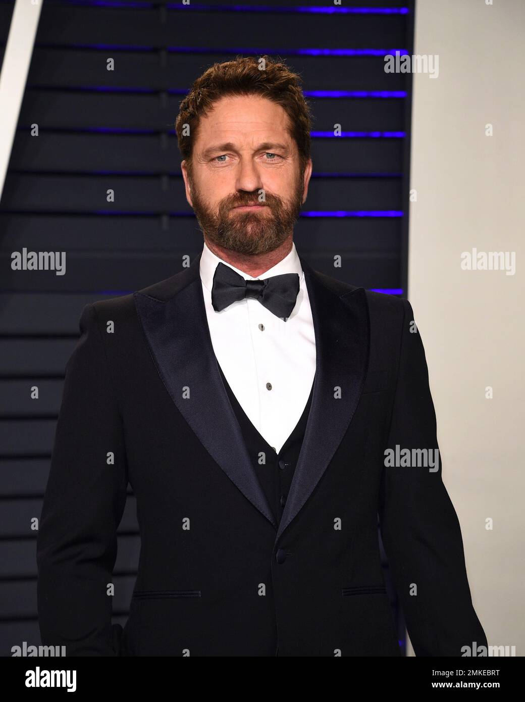 Gerard Butler arrives at the Vanity Fair Oscar Party on Sunday, Feb. 24 ...