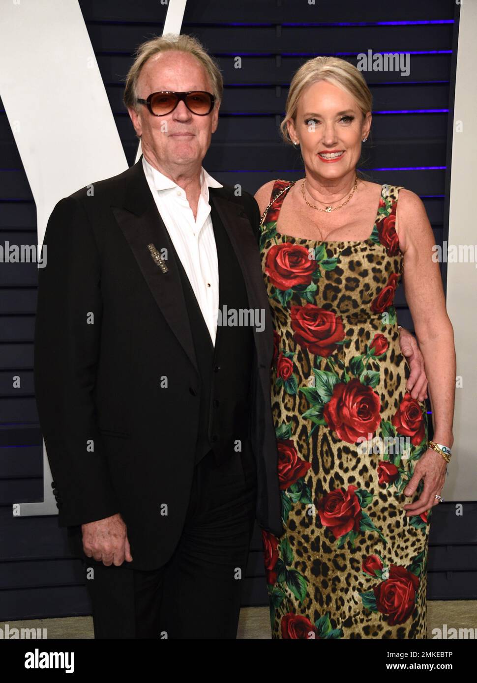Peter Fonda, left, and Margaret DeVogelaere arrive at the Vanity Fair ...