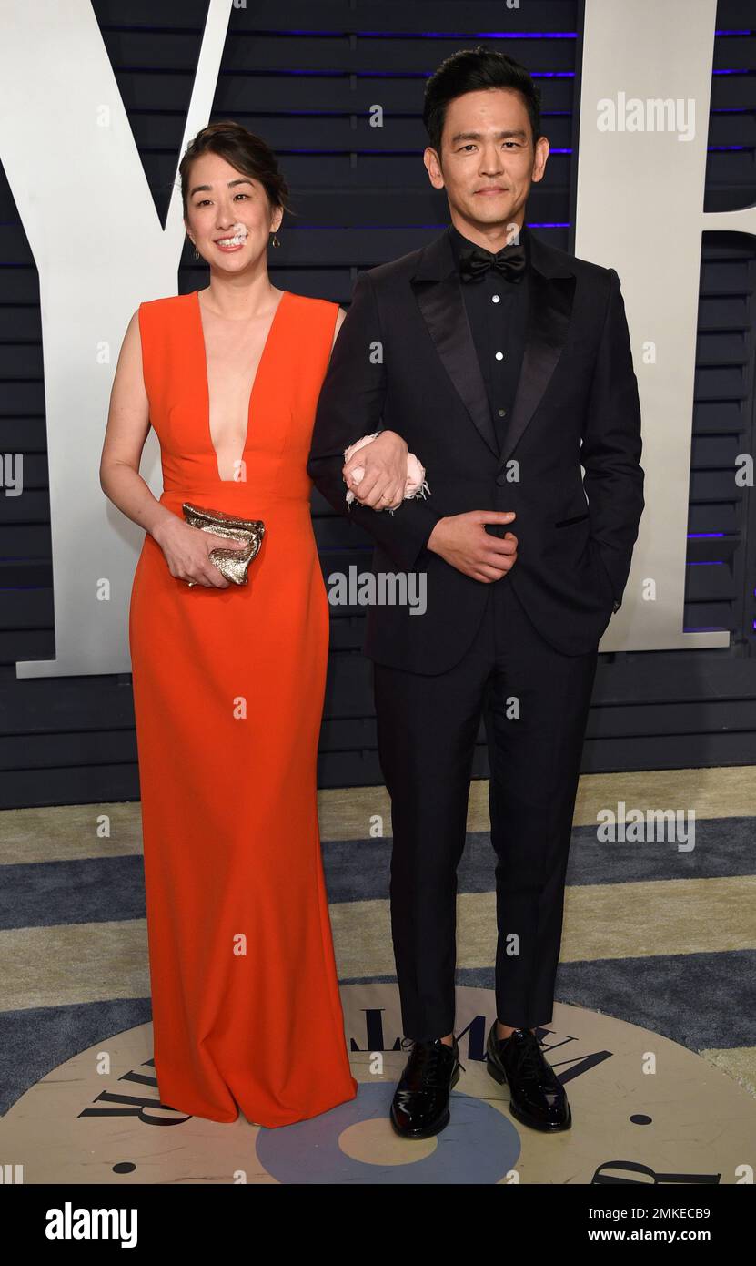 John Cho, right, and Kerri Higuchi arrive at the Vanity Fair Oscar ...