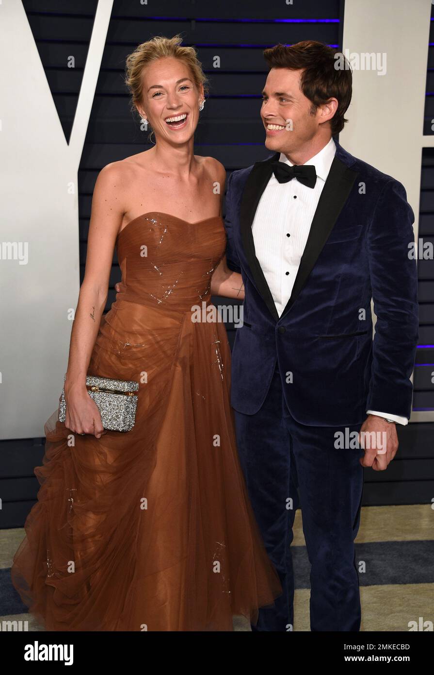 James Marsden, right, and Emma Deigman arrive at the Vanity Fair Oscar ...