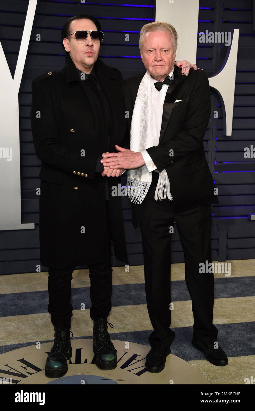 Marilyn Manson, left, and Jon Voight arrive at the Vanity Fair Oscar ...