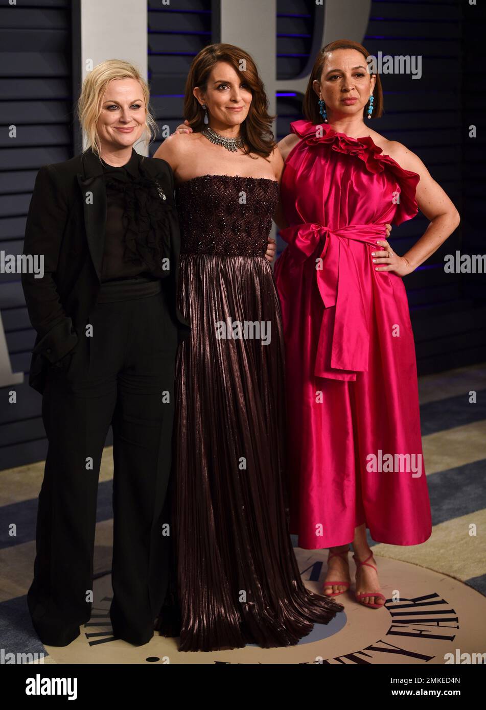 Amy Poehler, from left, Tina Fey and Maya Rudolph arrive at the Vanity ...