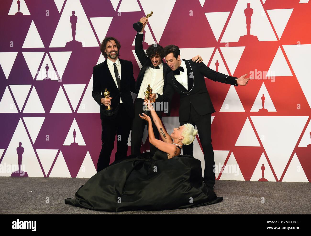 Lady Gaga, front, Andrew Wyatt, from back left, Anthony Rossomando, and ...