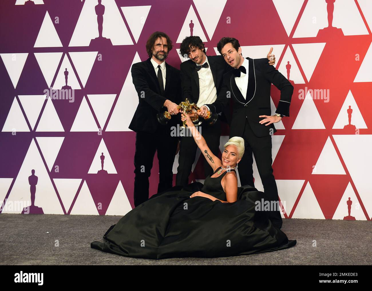 Lady Gaga, front, Andrew Wyatt, from back left, Anthony Rossomando, and ...