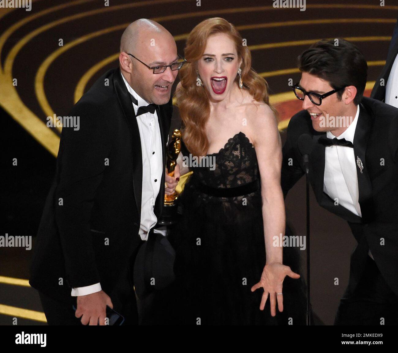 Sharon Maymon, from left, Jaime Ray Newman and Guy Nattiv accept the ...