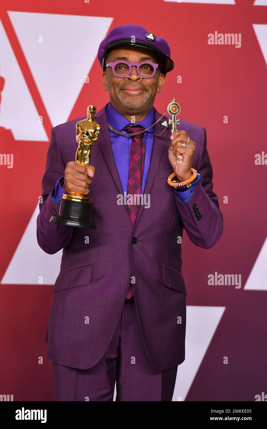 Spike Lee poses with the award for best adapted screenplay for ...