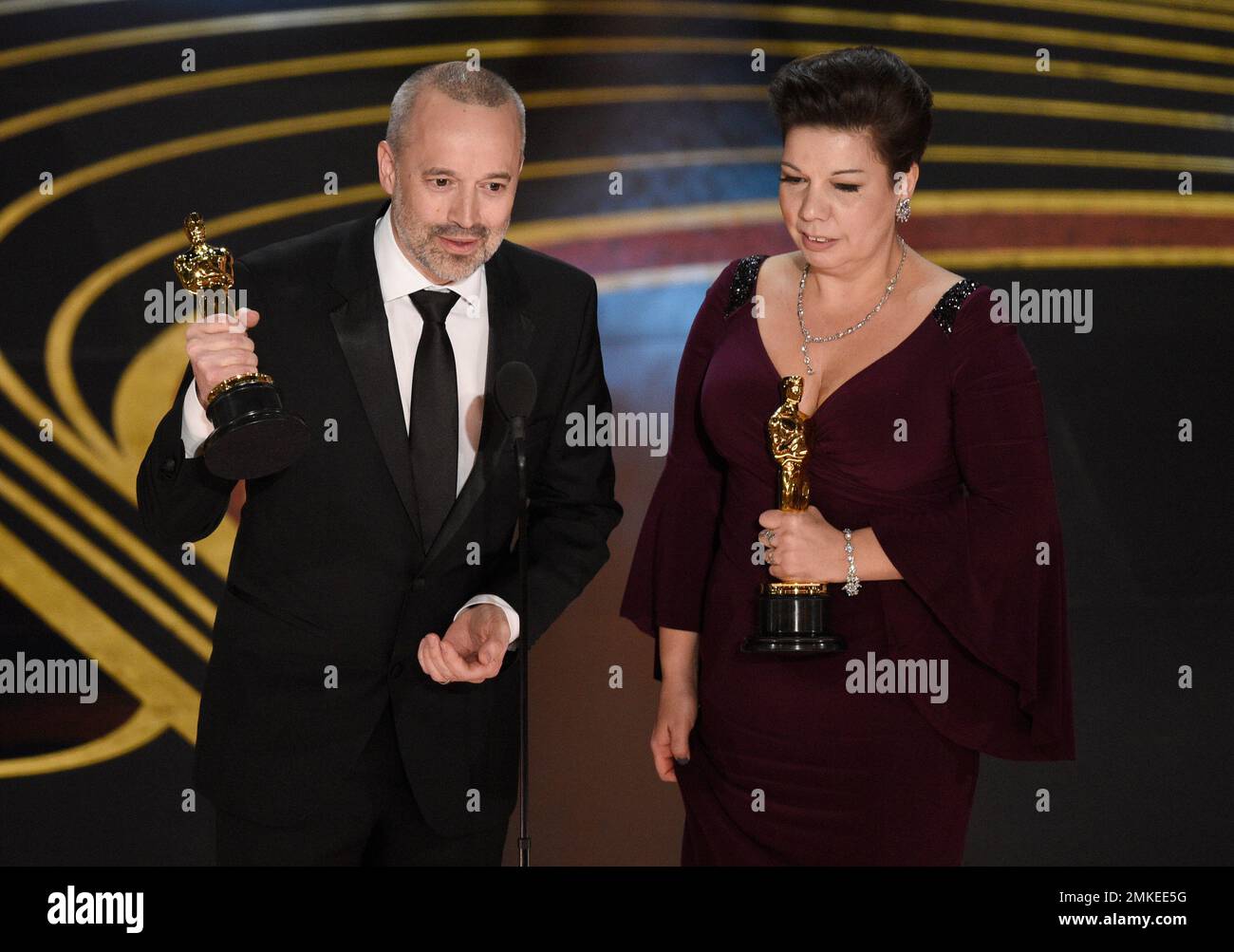 John Warhurst, left, and Nina Hartstone accept the award for best sound ...