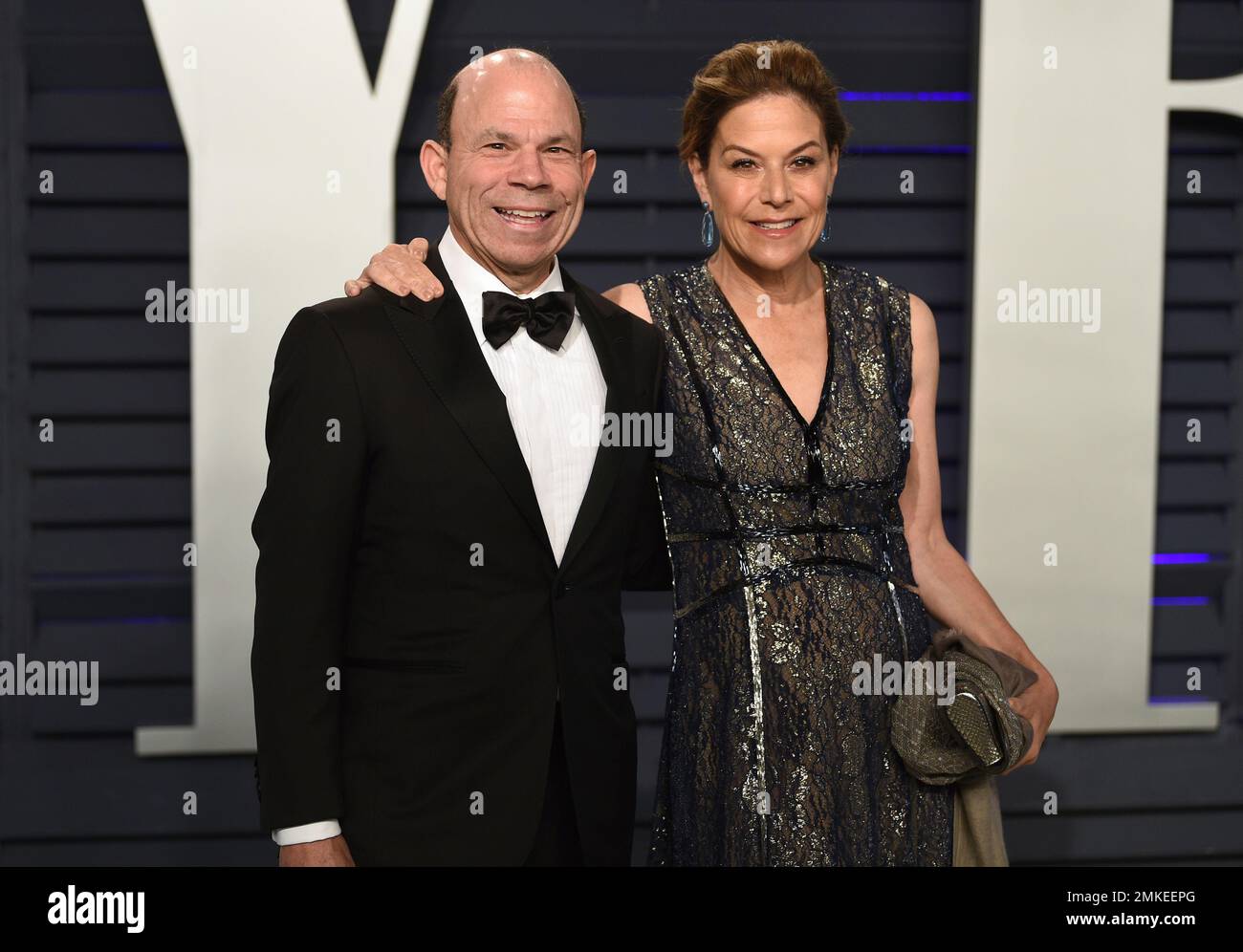 Steven O. Newhouse, left, and Gina Sanders arrive at the Vanity Fair Oscar Party on Sunday, Feb ...