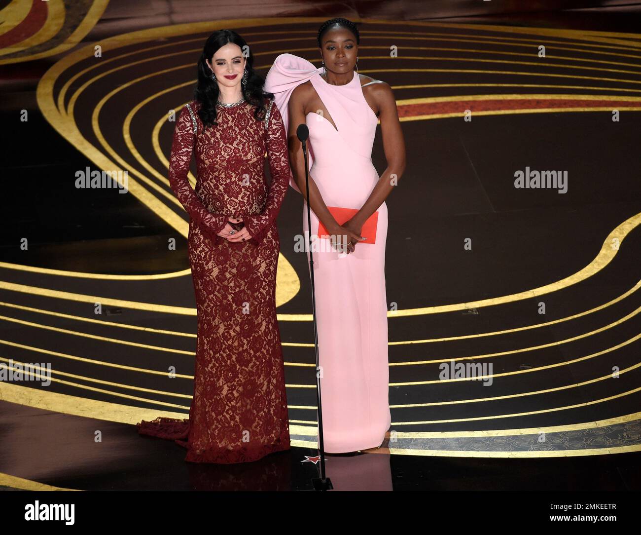 Krysten Ritter, left, and Kiki Layne present the award for best live ...