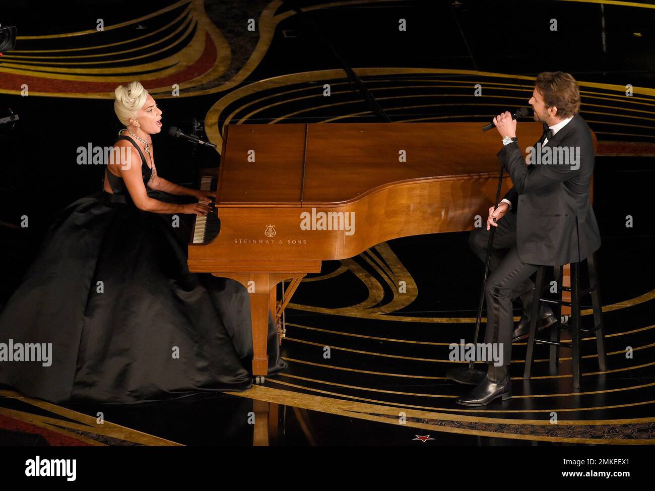 Lady Gaga, left, and Bradley Cooper perform "Shallow" from "A Star is ...