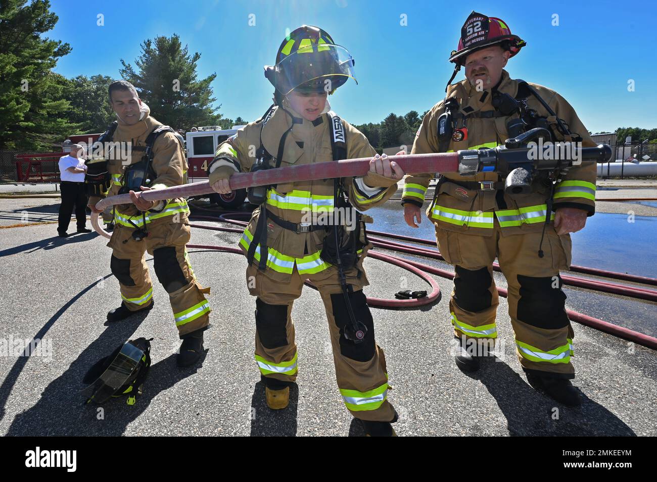 Col. Taona Enriquez, installation commander, and Chief Master Sgt. Alan ...