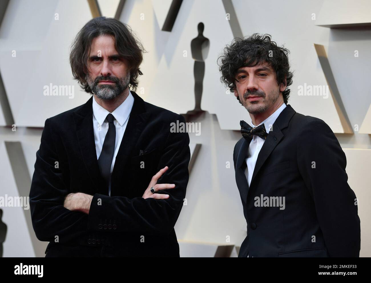 Andrew Wyatt, left, and Anthony Rossomando arrive at the Oscars on ...