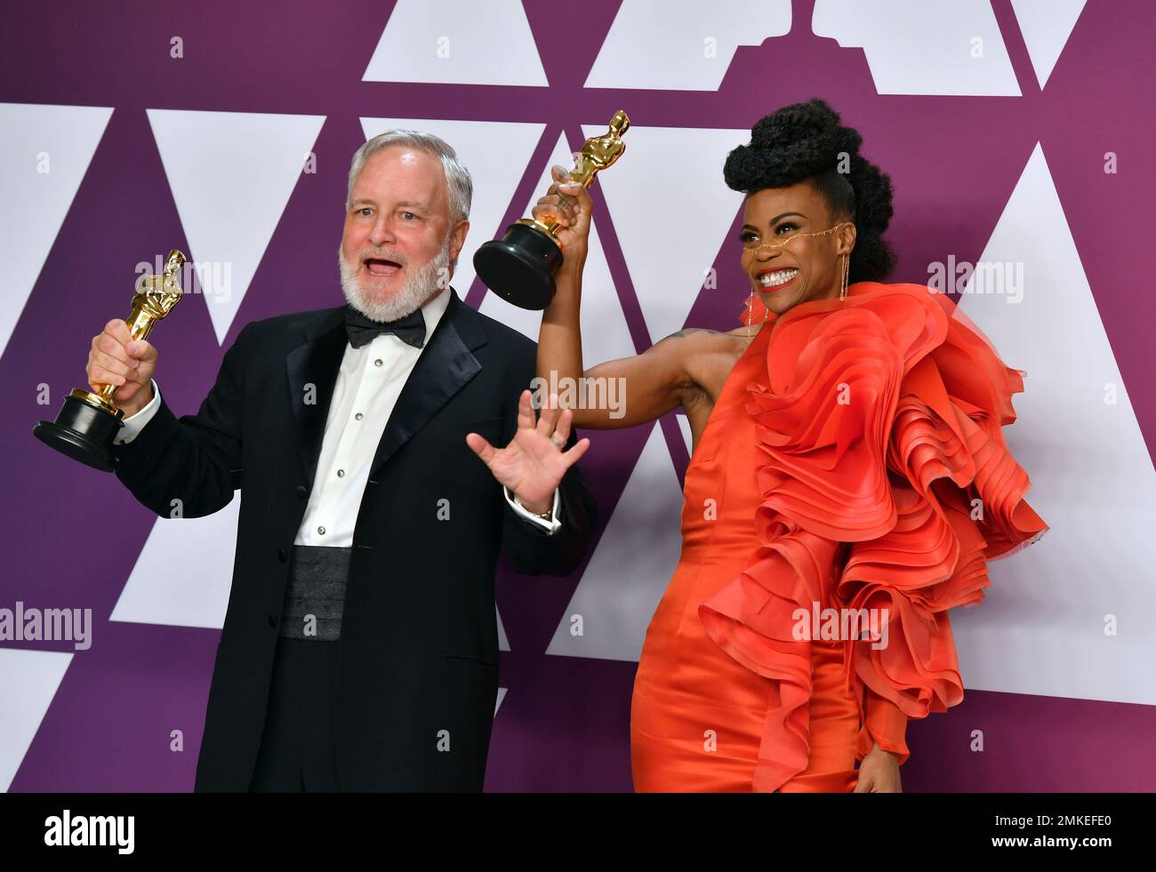 Jay Hart, left, and Hannah Beachler pose with the award for best ...
