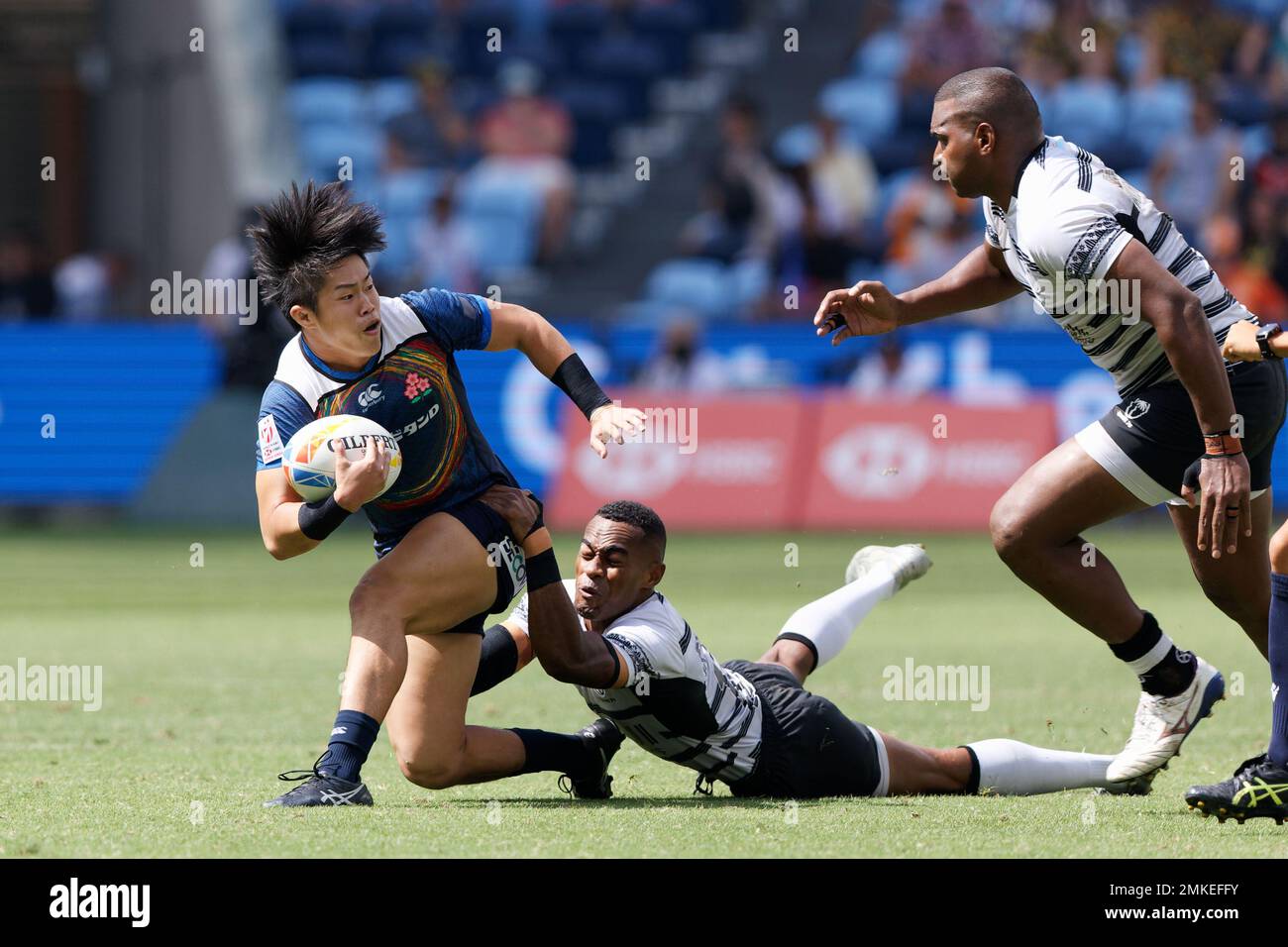 Sydney, Australia. 28th Jan, 2023. Kazuma Ueda of Japan is tackled ...
