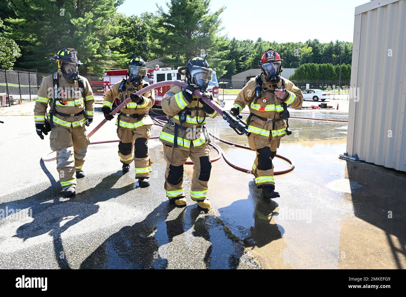 Col. Taona Enriquez, center, installation commander, and Chief Master ...