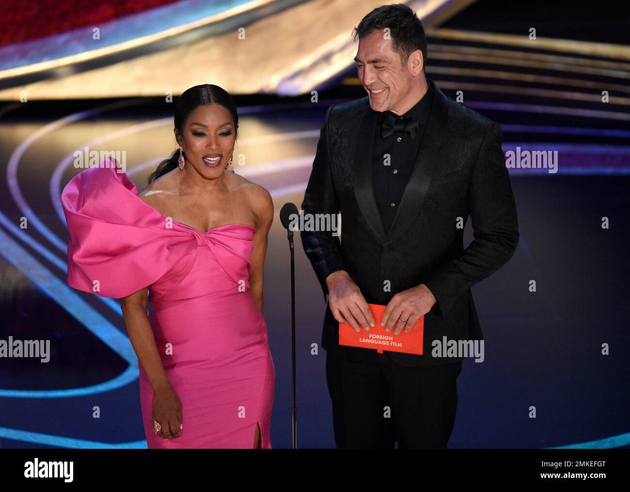 Angela Bassett, left, and Javier Bardem present the award for best ...
