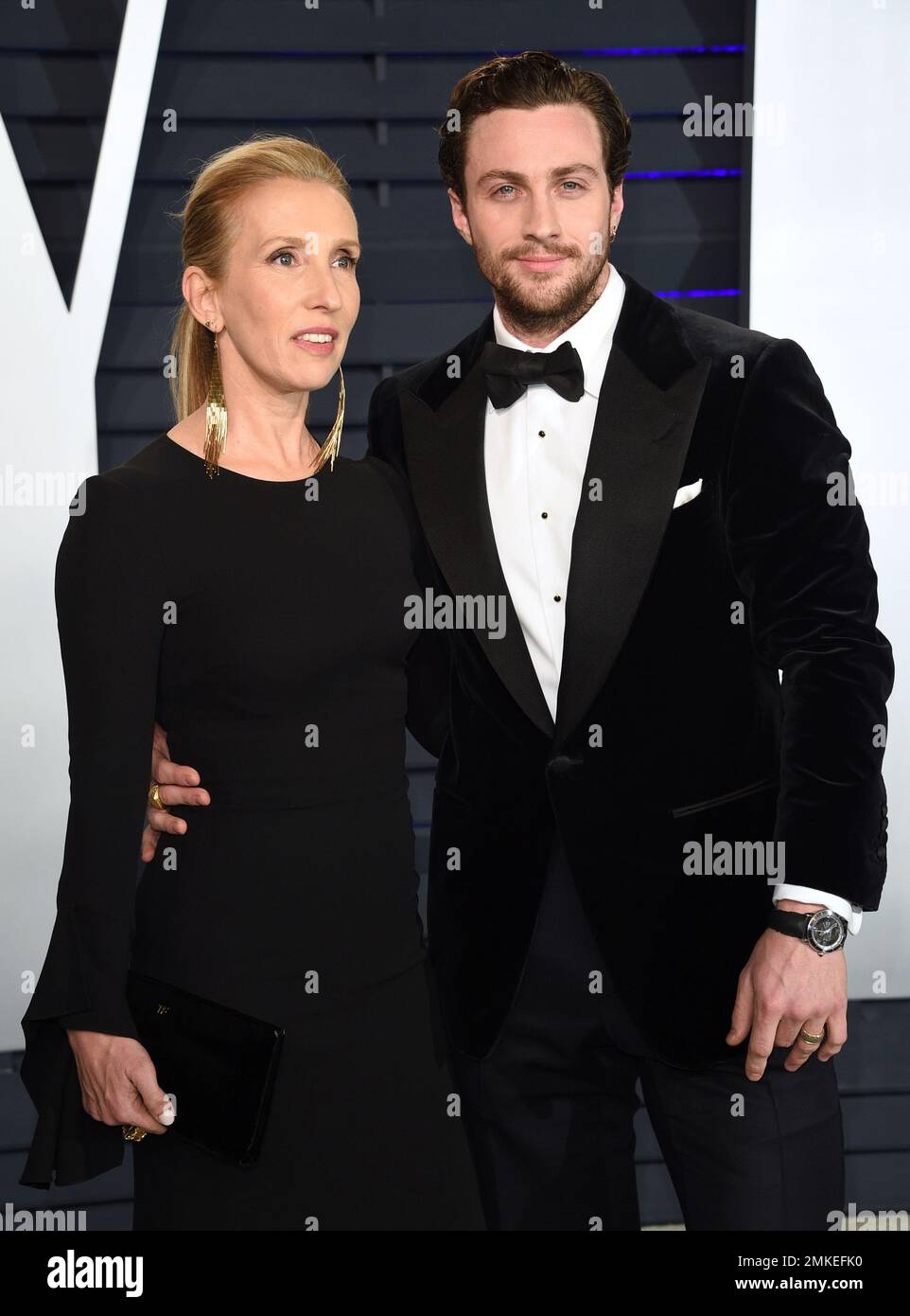 Sam Taylor-Johnson, left, and Aaron Taylor-Johnson arrive at the Vanity ...