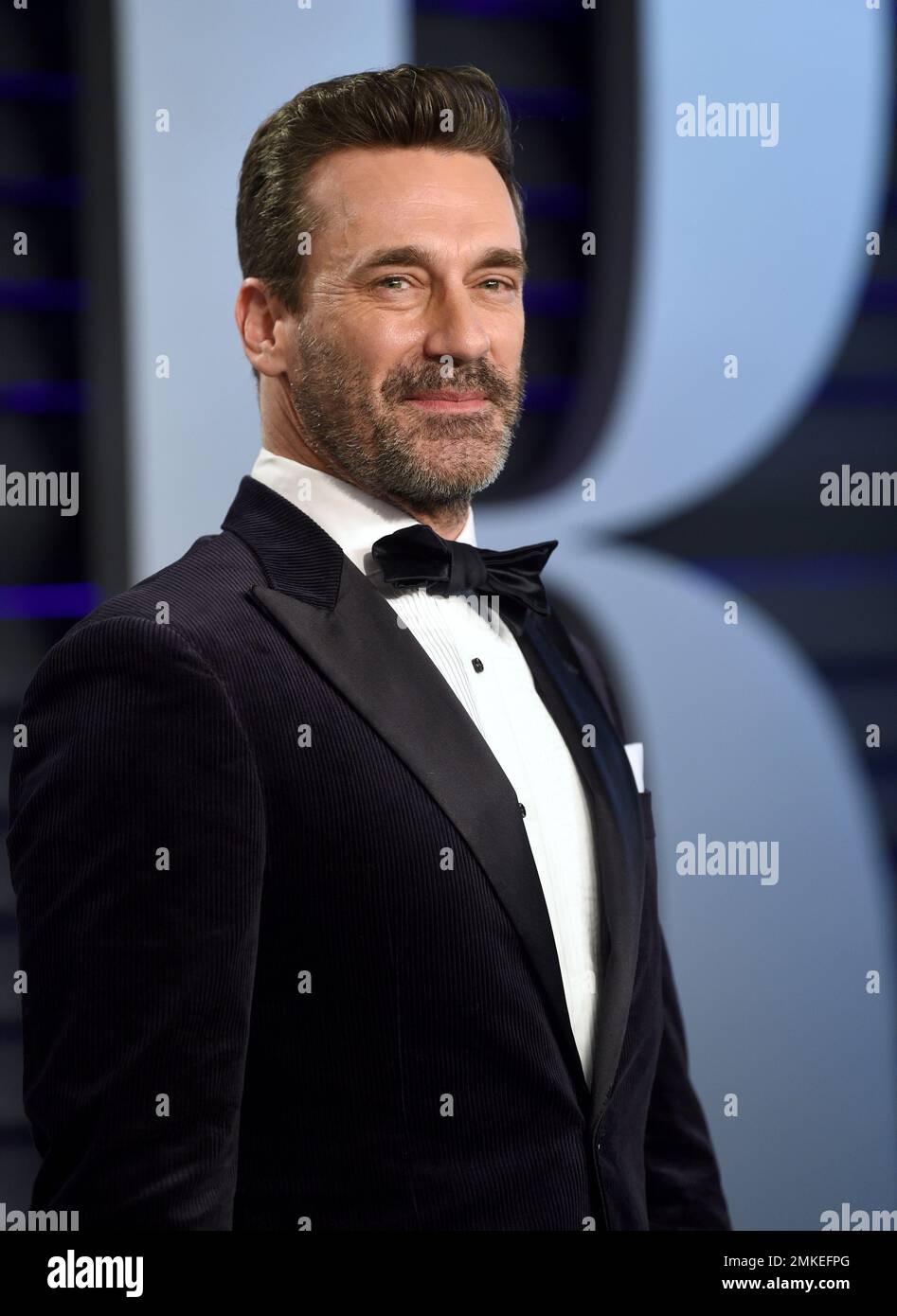 Jon Hamm arrives at the Vanity Fair Oscar Party on Sunday, Feb. 24 ...