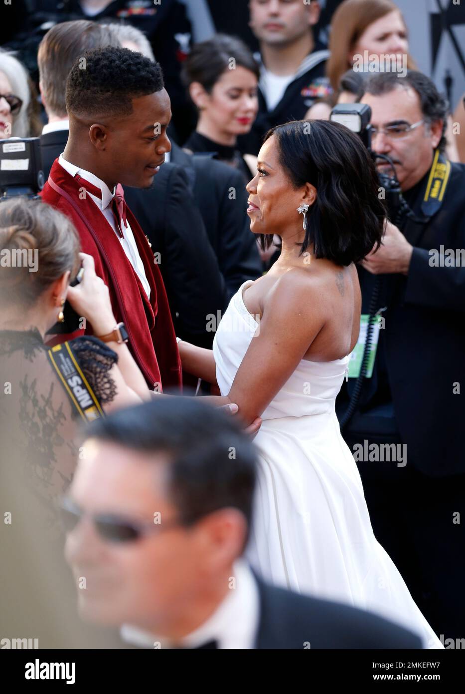 Stephan James, left, and Regina King arrive at the Oscars on Sunday ...