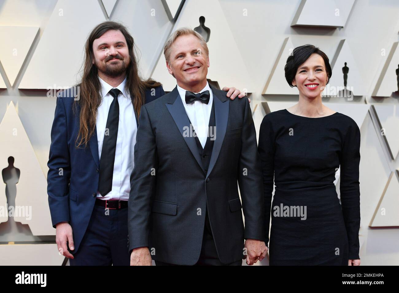 Henry Mortensen, from left, Viggo Mortensen, and Ariadna Gil arrive at ...