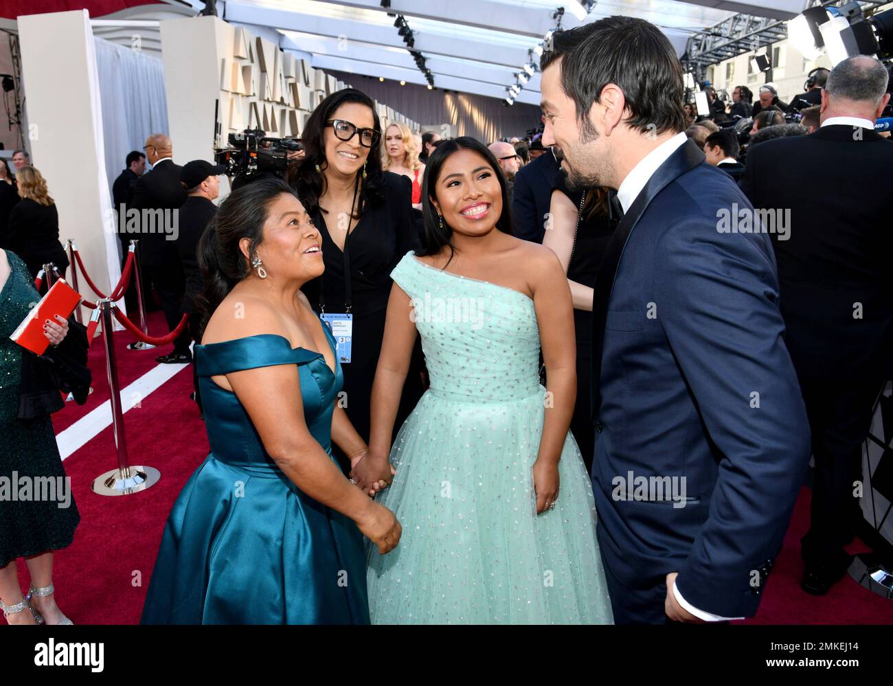 Margarita Martinez Merino, left, speaks with Diego Luna, right, as ...
