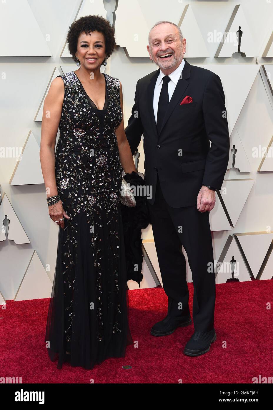 Cheryl Boone Isaacs, left, and Stanley Isaacs arrive at the Oscars on ...
