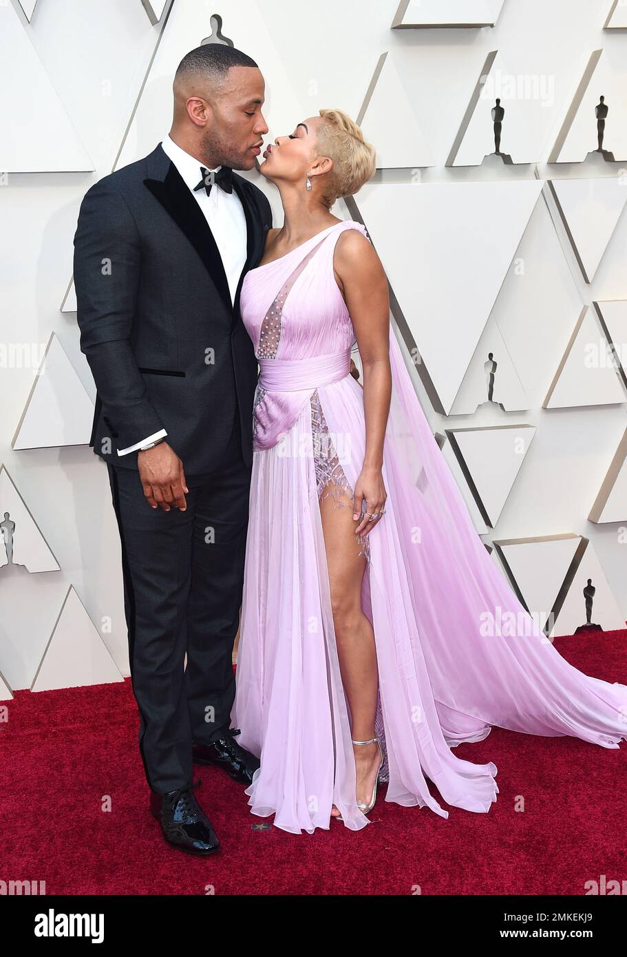 DeVon Franklin, left, and Meagan Good arrive at the Oscars on Sunday ...