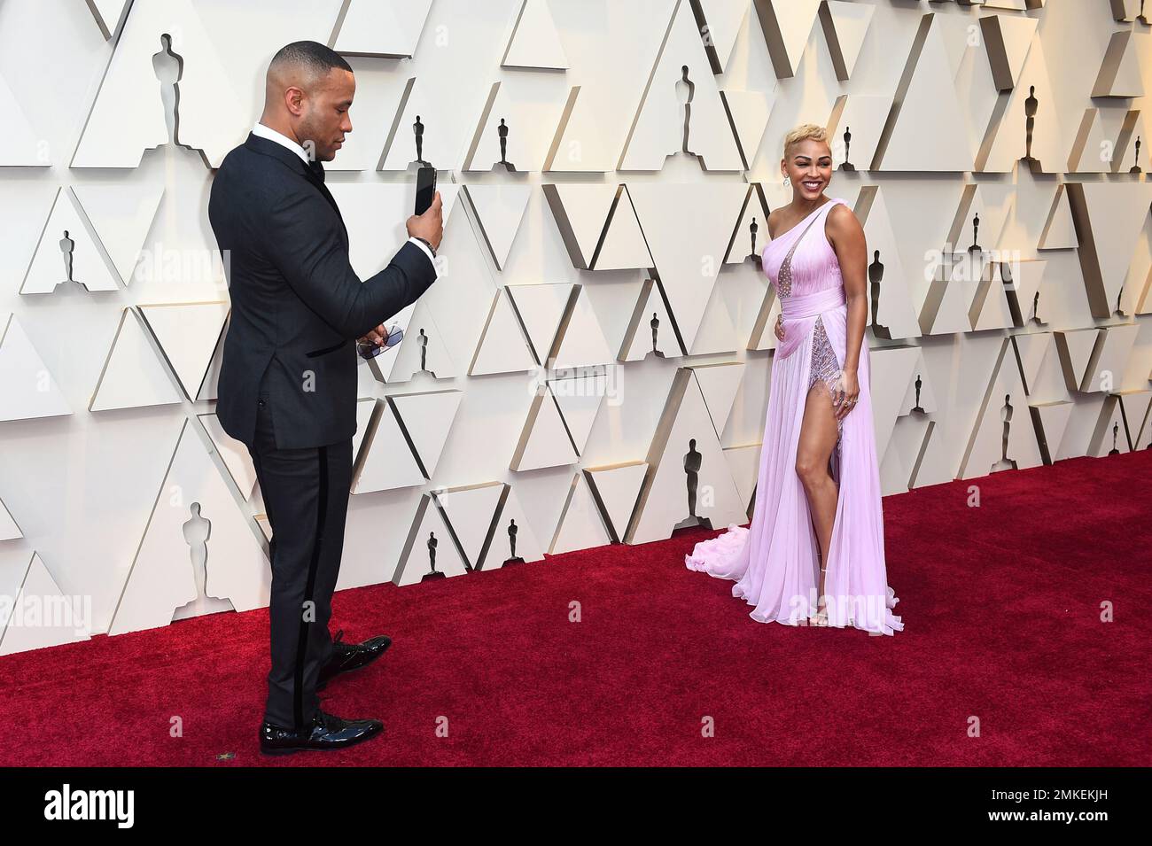 DeVon Franklin, left, and Meagan Good arrive at the Oscars on Sunday ...