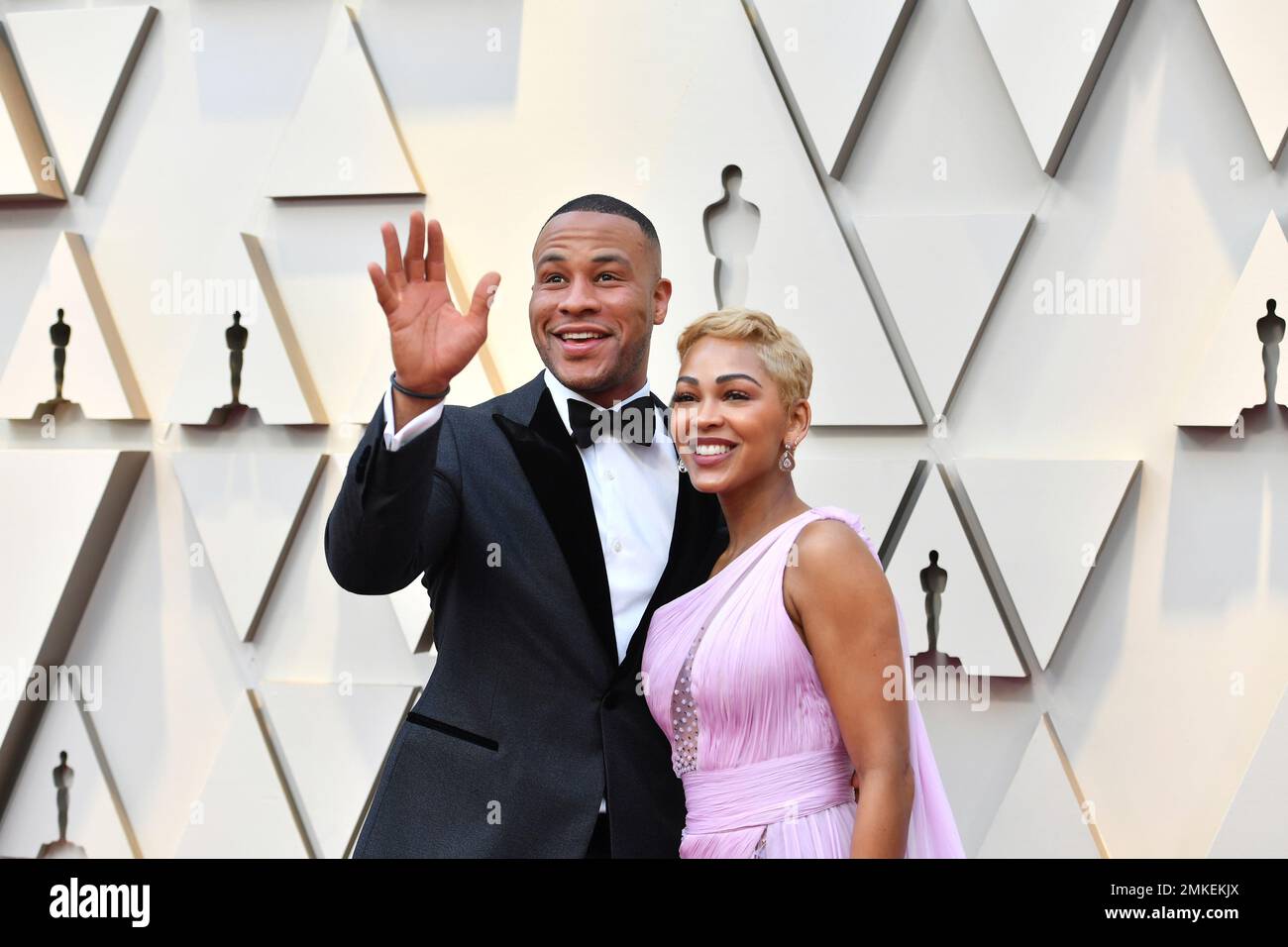 DeVon Franklin, left, and Meagan Good arrive at the Oscars on Sunday ...