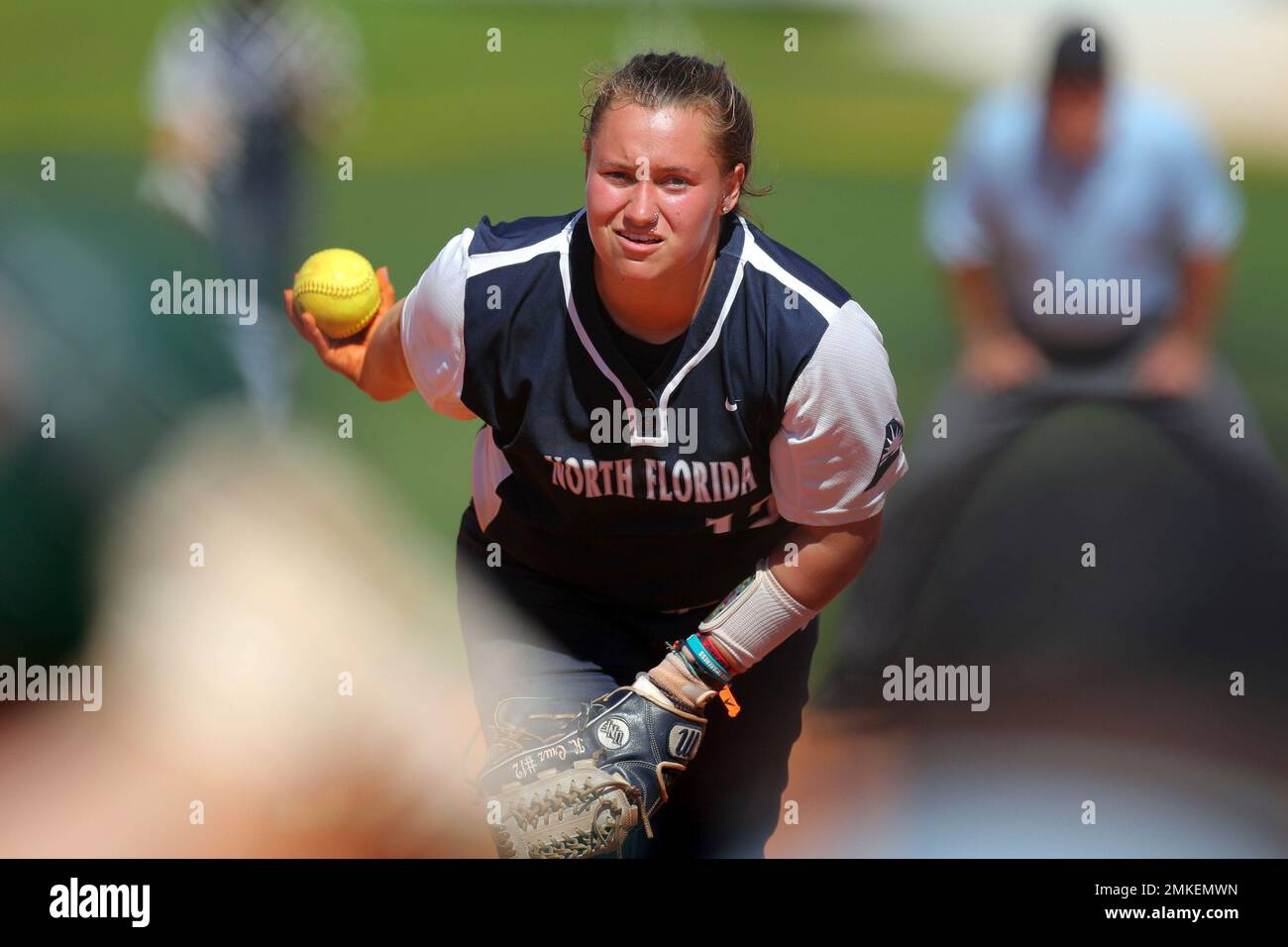 Kayla Cruz of North Florida pitches against Manhattan during an NCAA ...
