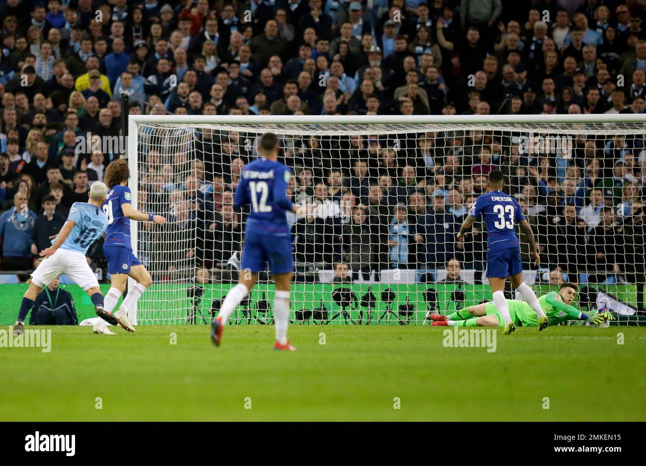 Chelsea goalkeeper Kepa Arrizabalaga, right, makes a save in front of ...
