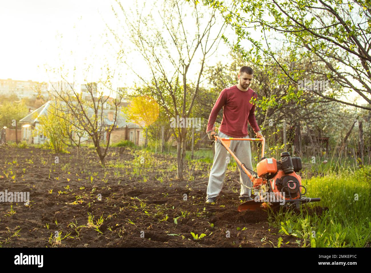 Man plows field walk hi-res stock photography and images - Alamy