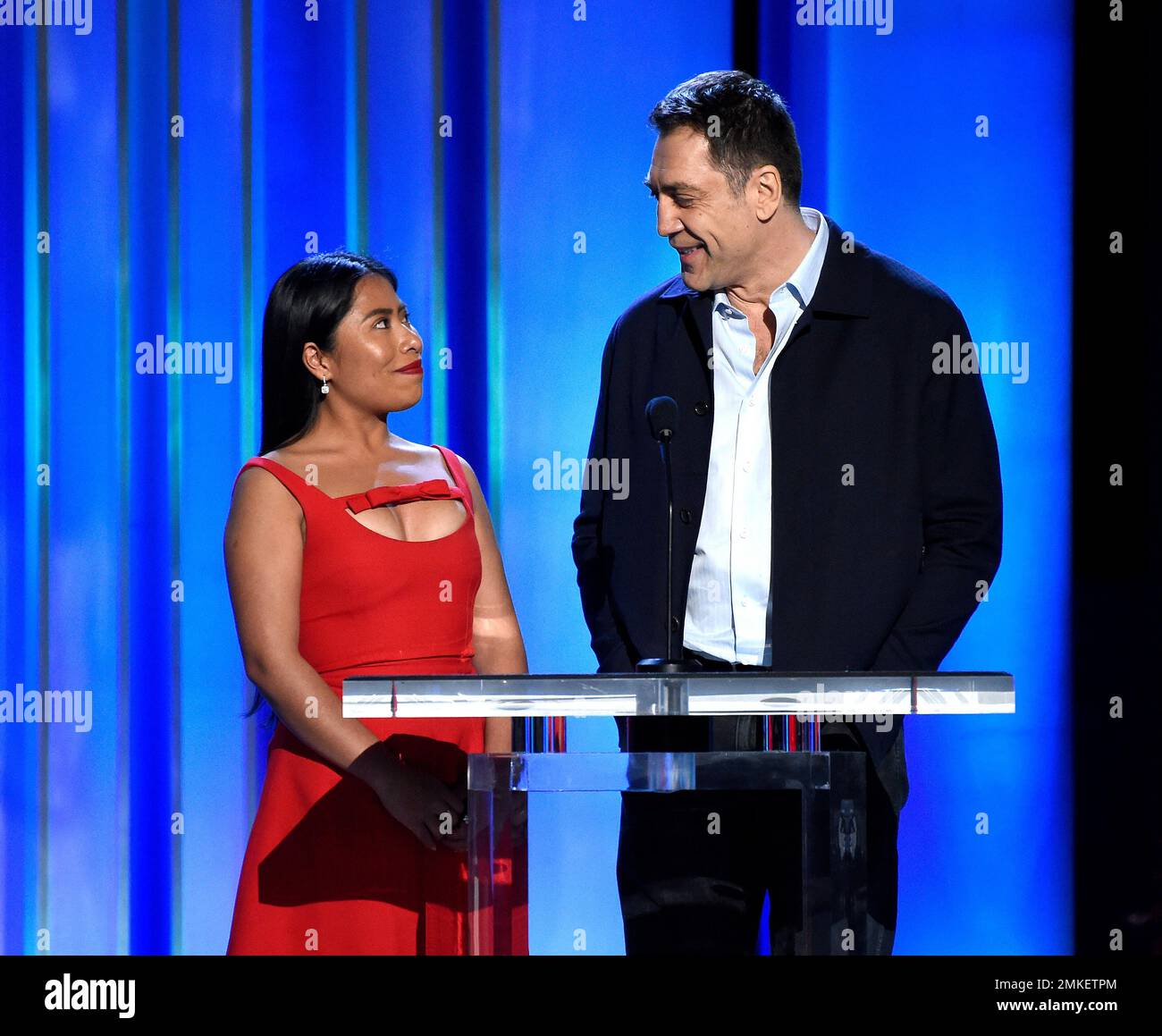 Yalitza Aparicio, left, and Javier Bardem present the award for best ...