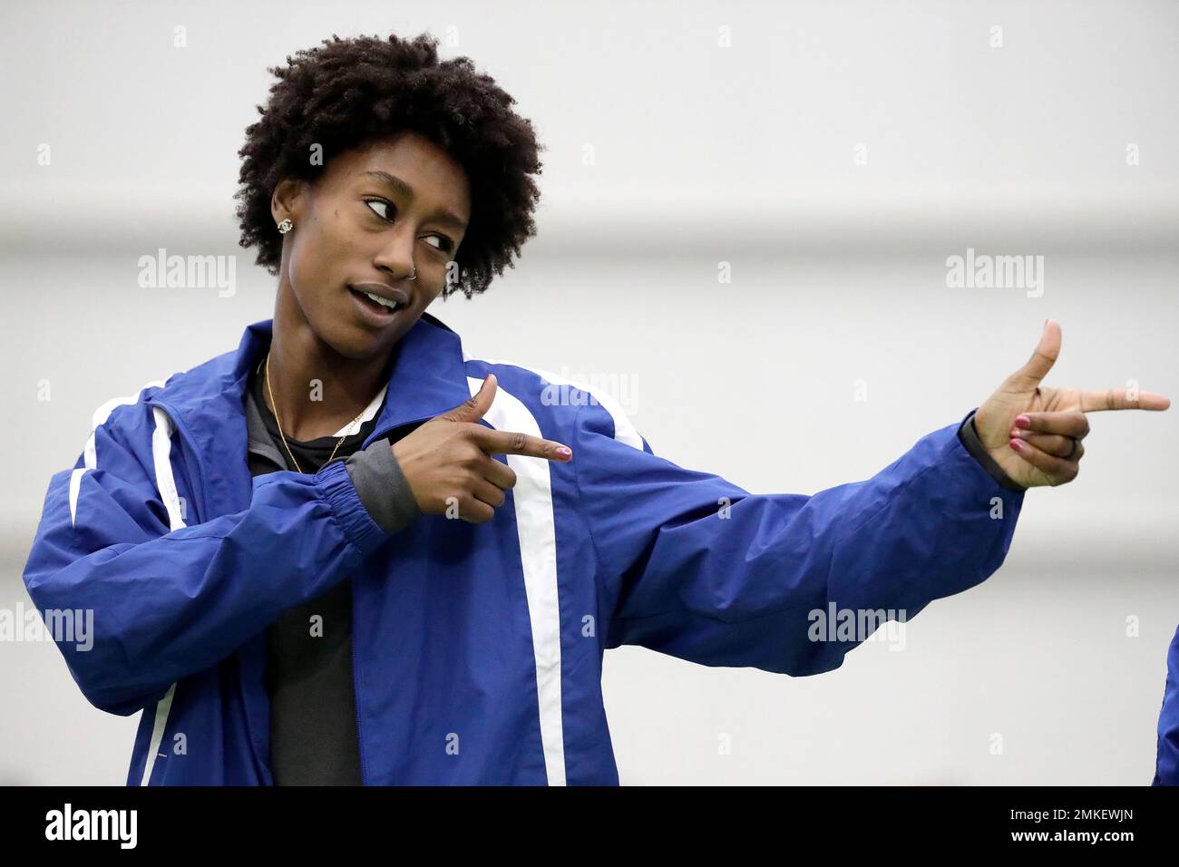 Amina Smith gestures while being introduced prior to the women's high ...