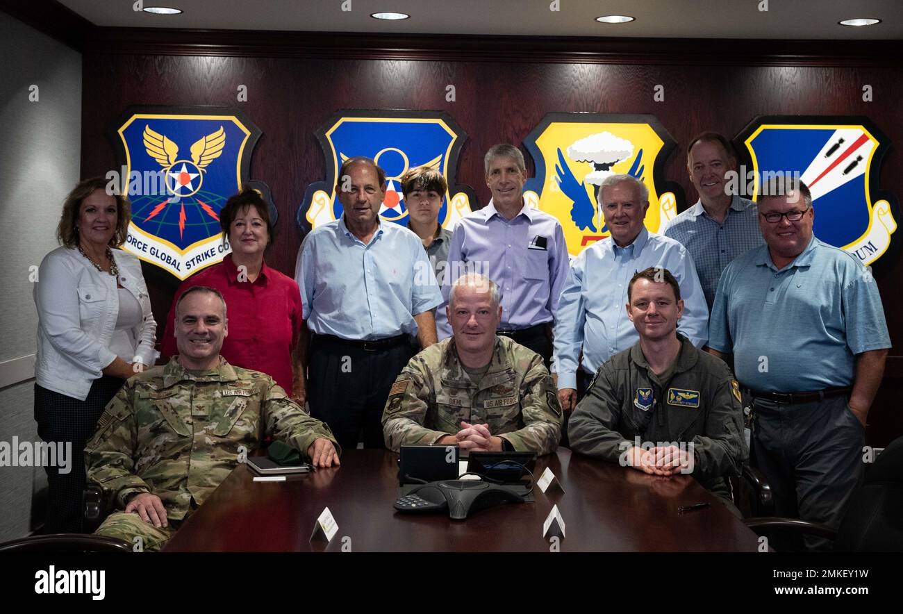 Federal Aviation Administration members and guests stand for a photo ...
