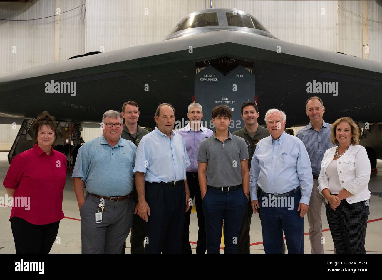 Federal Aviation Administration members and guests stand for a photo ...