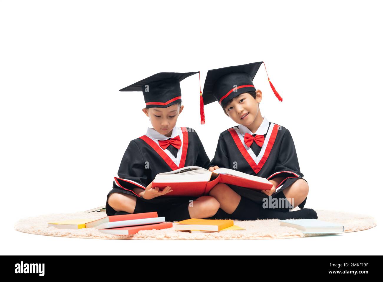 Children with a doctorial hat Stock Photo - Alamy