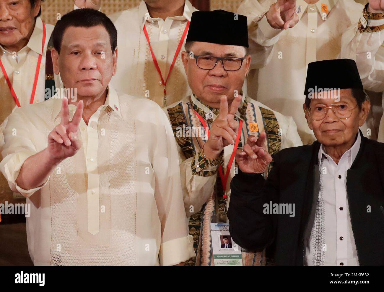 President Rodrigo Duterte, left, Murad Ebrahim, Chairman of the Moro ...