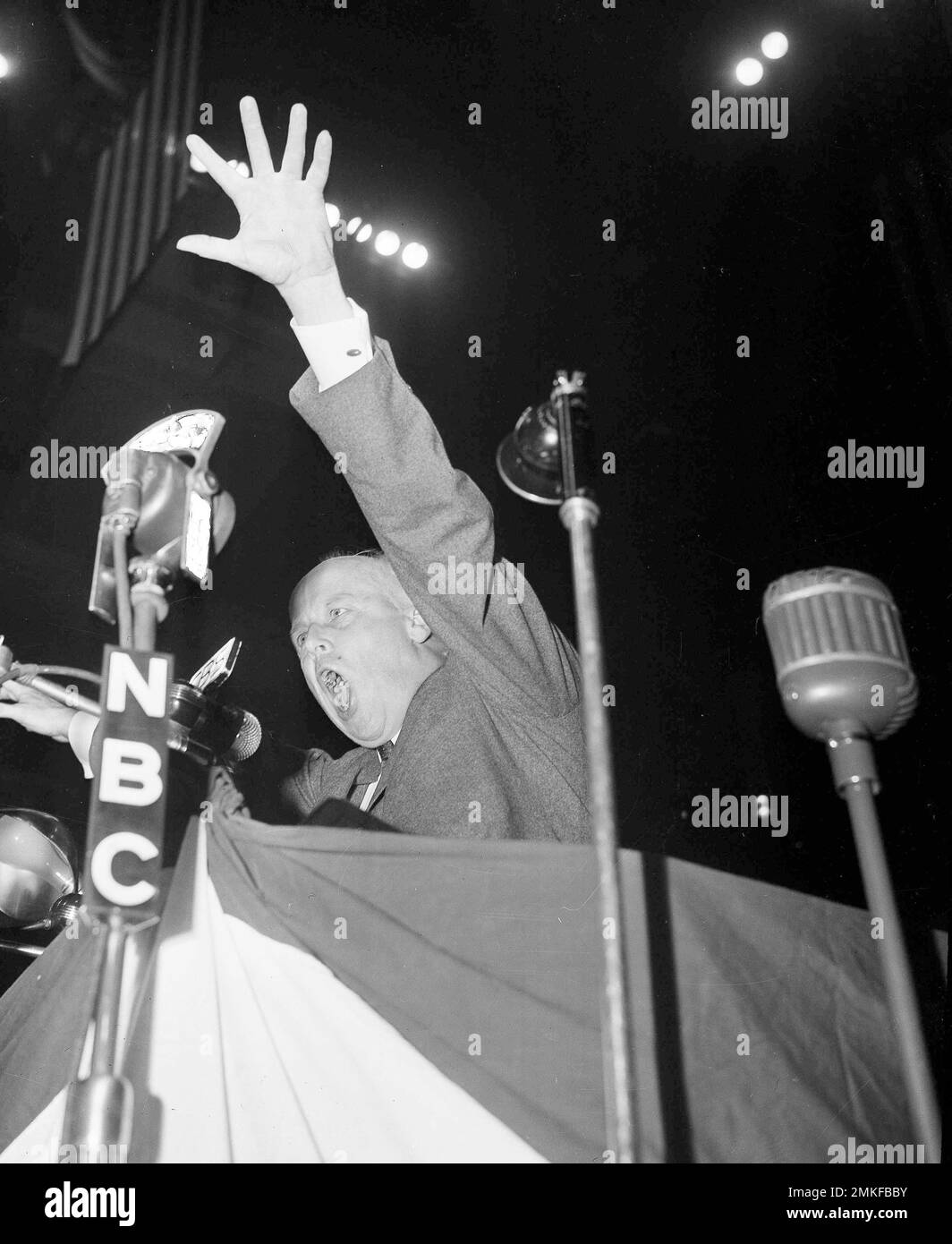 Socialist leader Norman Thomas strikes an oratorical pose as he ...