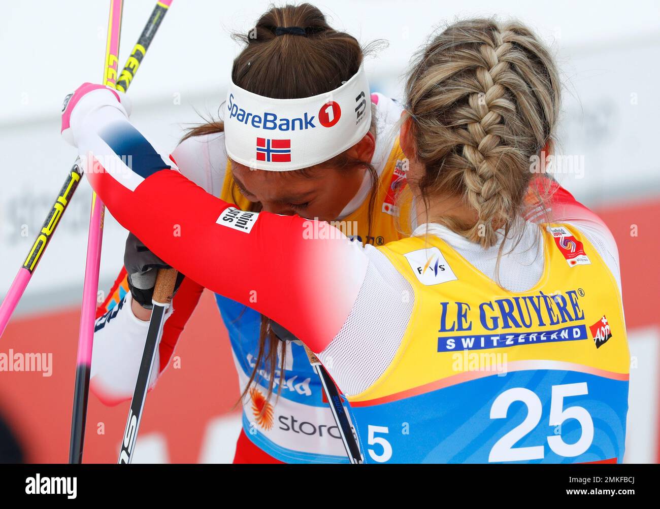 Norway's Kristine Stavaas Skistad, left, is comforted by her compatriot ...
