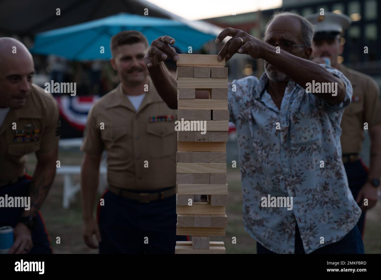 A Maryland resident plays an intense game of Jenga with U.S. Marines ...