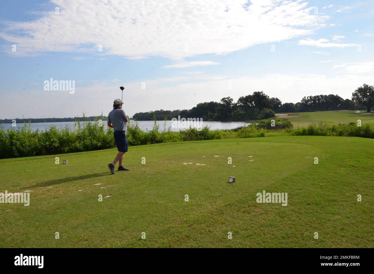 Dave Klemm tees off on hole 8 of Bayou Course on Naval Air Station ...