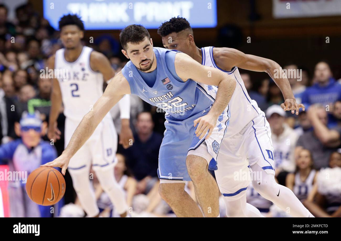 Duke's Javin DeLaurier guards North Carolina's Luke Maye (32) during ...