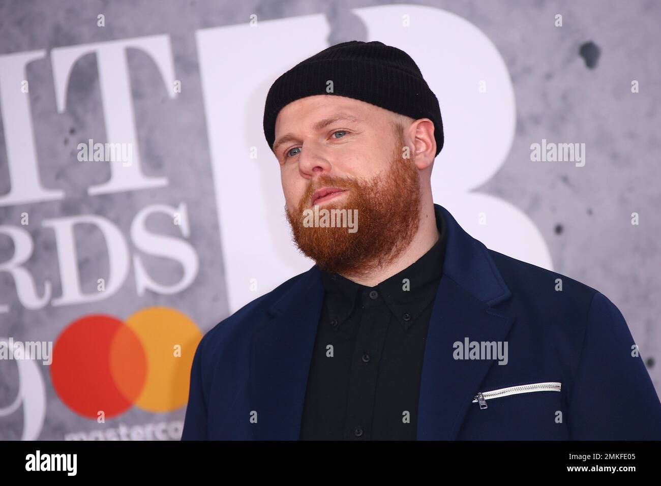 Tom Walker poses for photographers upon arrival at the Brit Awards in ...