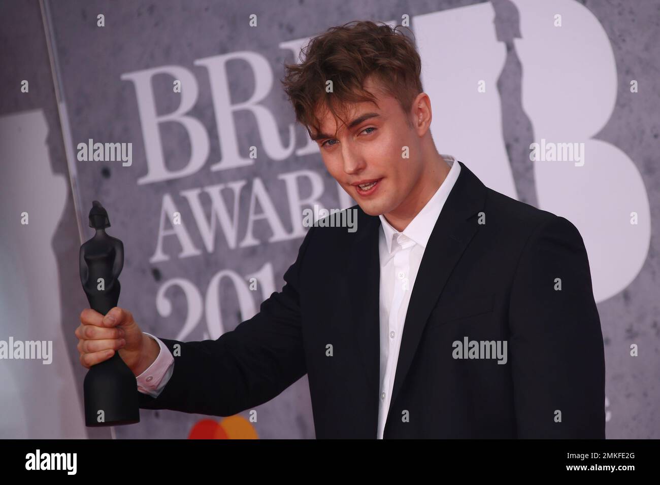 Sam Fender poses for photographers upon arrival at the Brit Awards in ...
