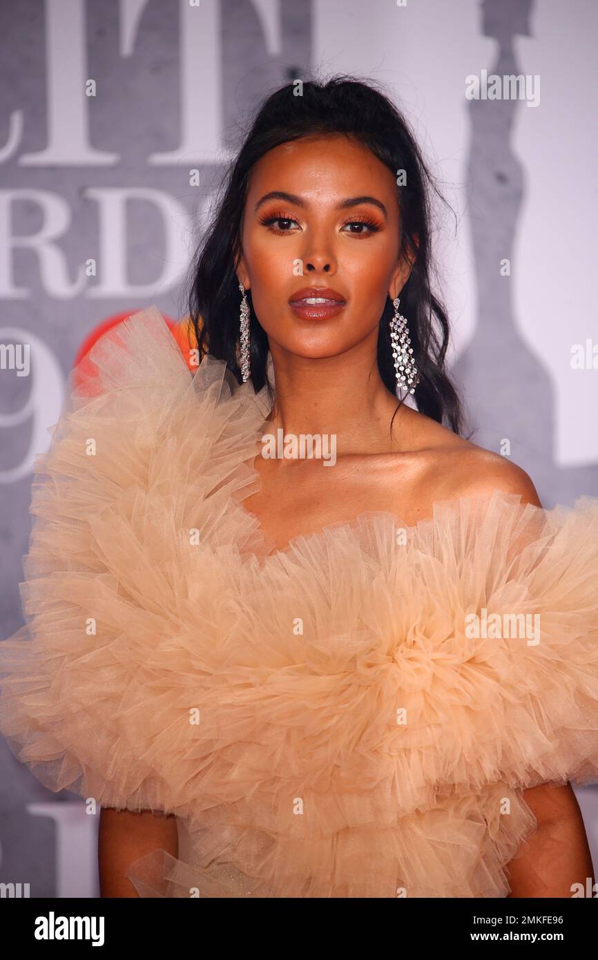 Maya Jama poses for photographers upon arrival at the Brit Awards in ...