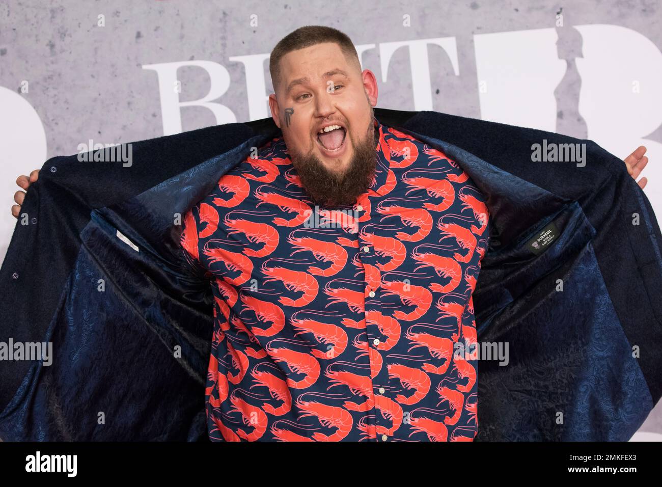 Singer Rag 'n' Bone Man poses for photographers upon arrival at the ...