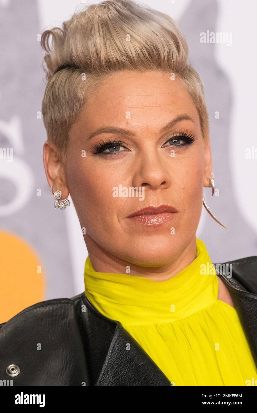 Singer Pink poses for photographers upon arrival at the Brit Awards in ...