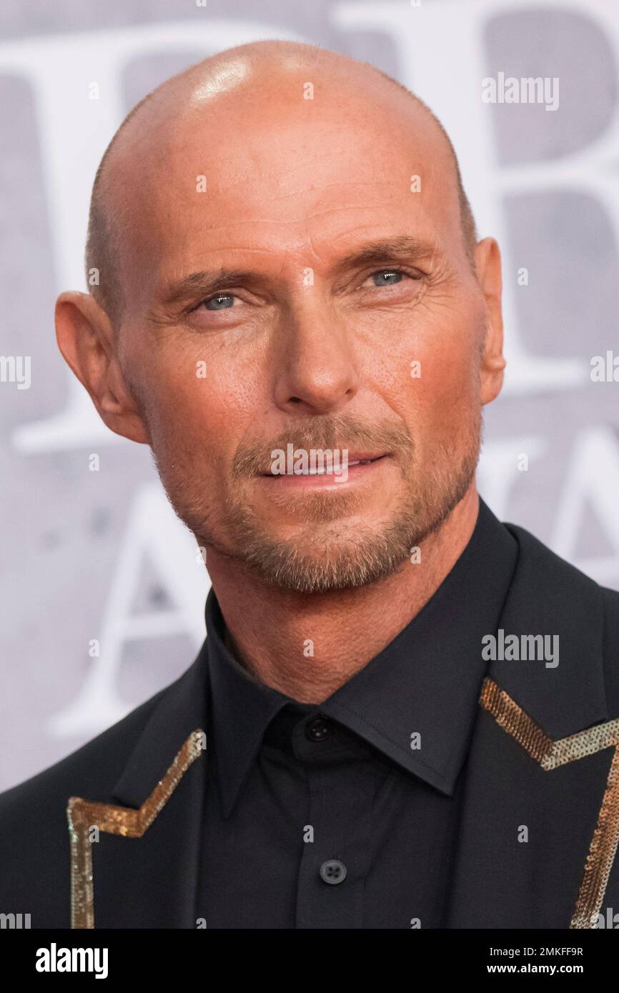 Luke Goss poses for photographers upon arrival at the Brit Awards 2019 ...